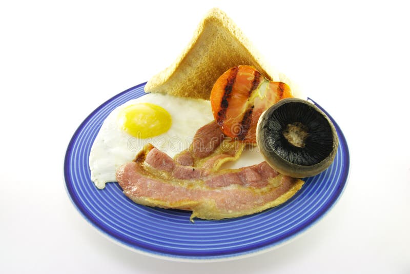 Bacon and Egg Breakfast on a Blue Plate Stock Photo - Image of crispy ...