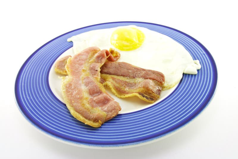 Bacon and Eggs on a Blue Plate Stock Photo - Image of breakfast, cooked ...