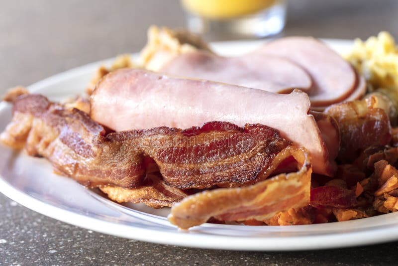 Bacon, Eggs and Ham Breakfast Served on a White Plate Stock Image ...