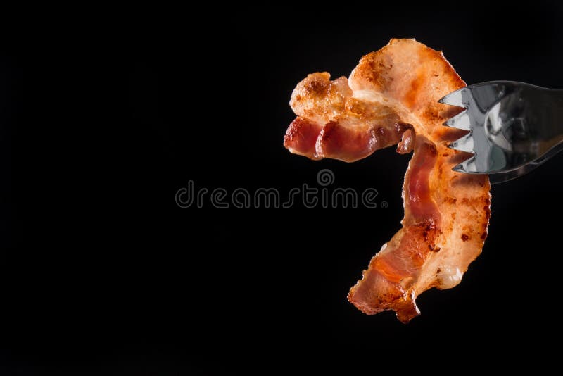 Bacon, Fresh Slice of Delicious Bacon Held with a Fork Stock Image ...