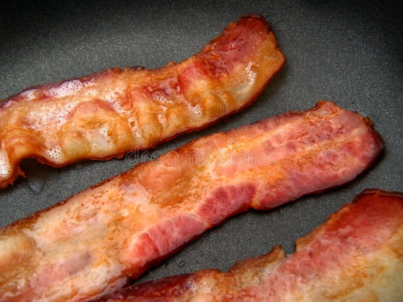 Bacon frying stock image. Image of breakfast, kitchen, restaurant - 705505