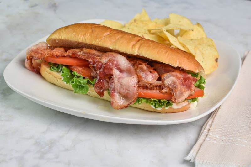 Blt Sub Served with Potato Chips Stock Image - Image of condiment, leaf ...