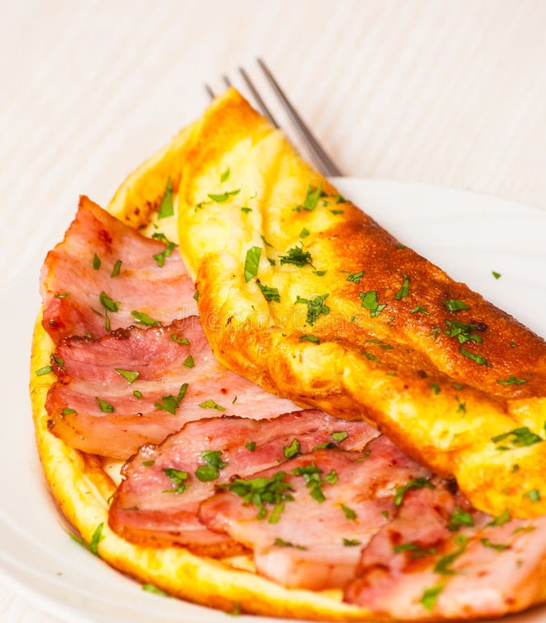 Egg and Bacon Omelet, Potatoes and Wheat Toast Stock Photo - Image of ...