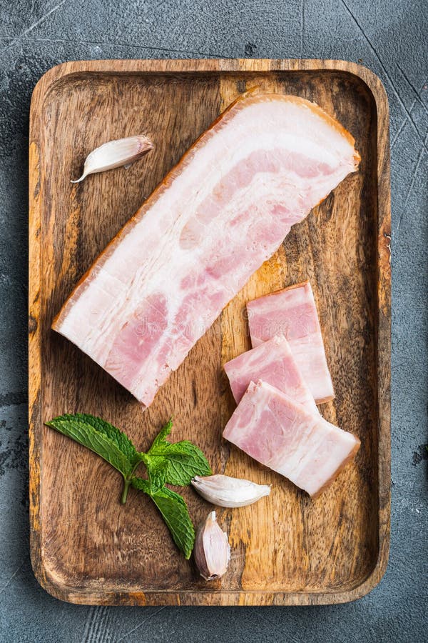 Bacon Pancetta Cut and Sliced on Grey Textured Background, Top View ...
