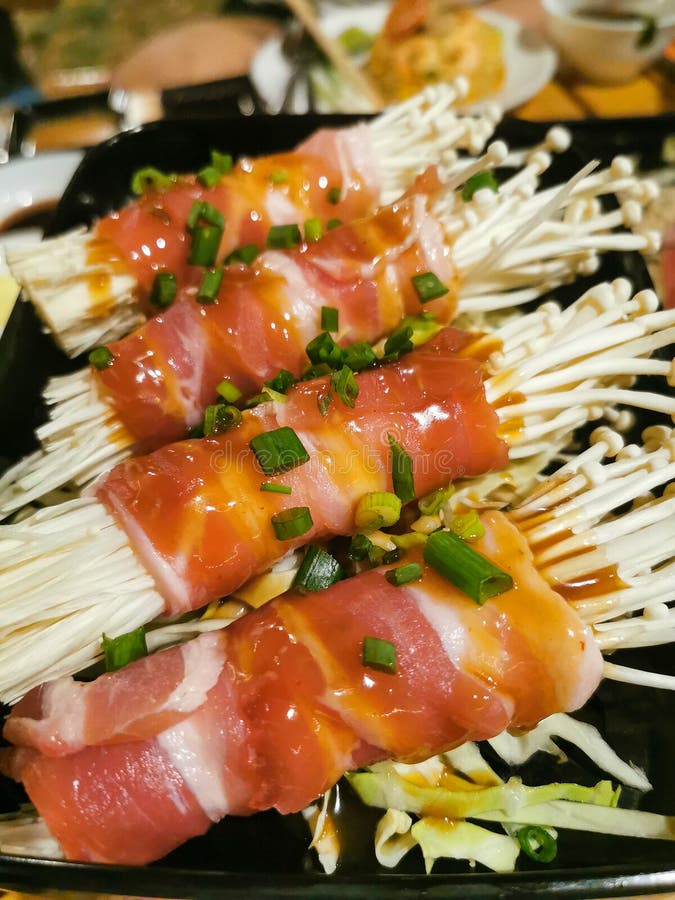 Bacon Roll Wrapped with Enoki Mushroom Stock Image - Image of golden ...