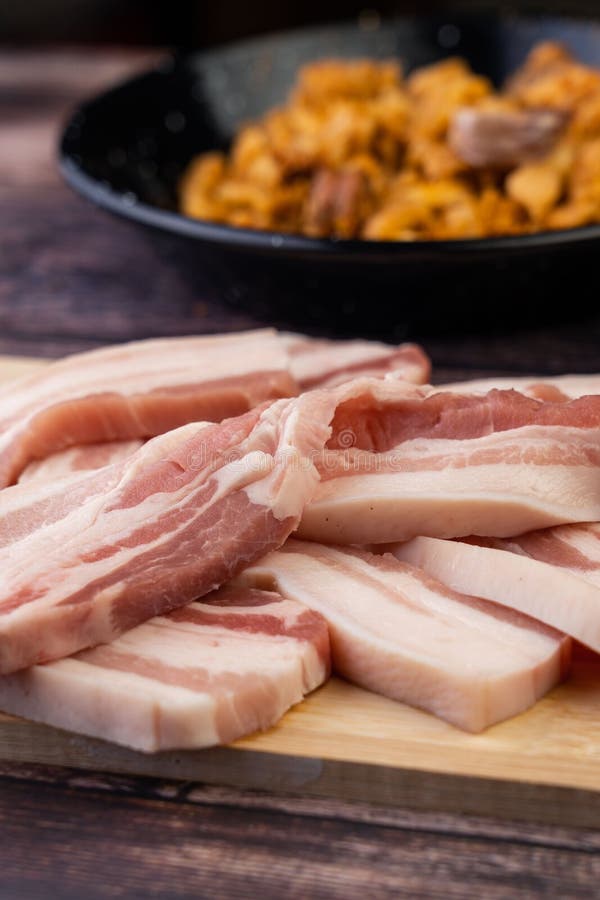 Bacon Strips, Leftover and Chopped Up, Sit on a Cutting Board Stock ...