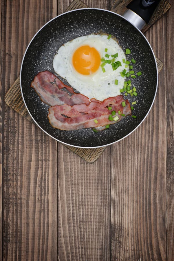 Bacon with sunny side up stock photo. Image of crispy - 72629986