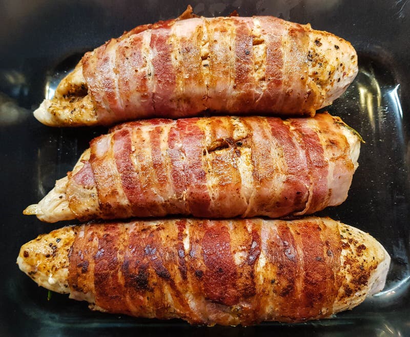 Wrapped chicken breast stock image. Image of grilled - 200215139