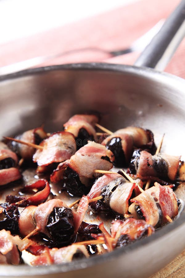 Bacon wrapped prunes stock image. Image of oeuvre, fruit - 49718969