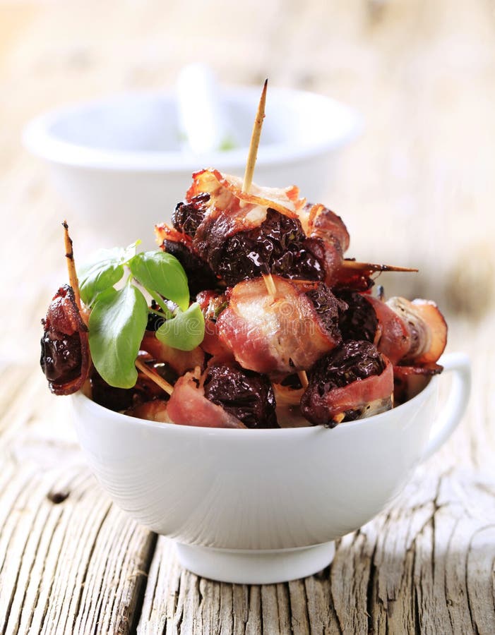 Bacon wrapped prunes stock photo. Image of rolled, snack - 18842676
