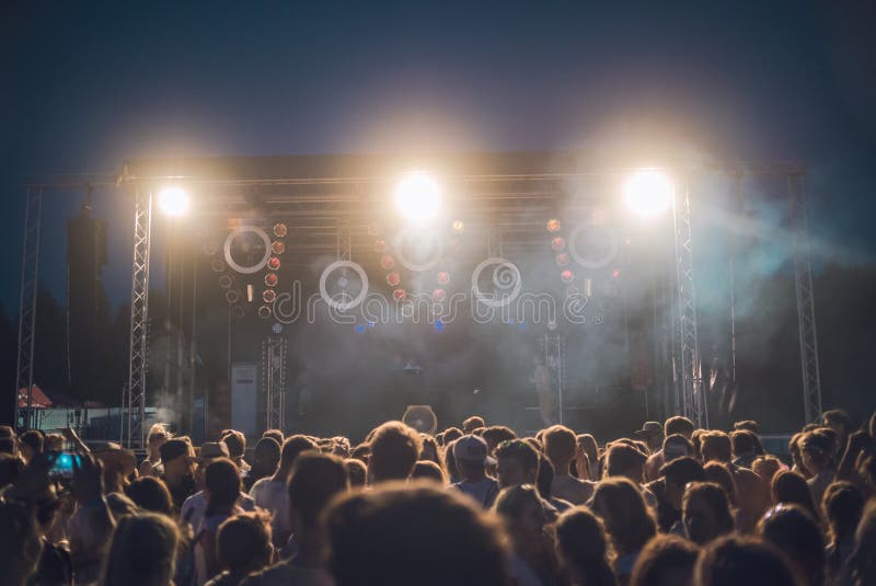 BAD AIBLING, GERMANY: Crowd in a Concert with a Stage in the Background ...