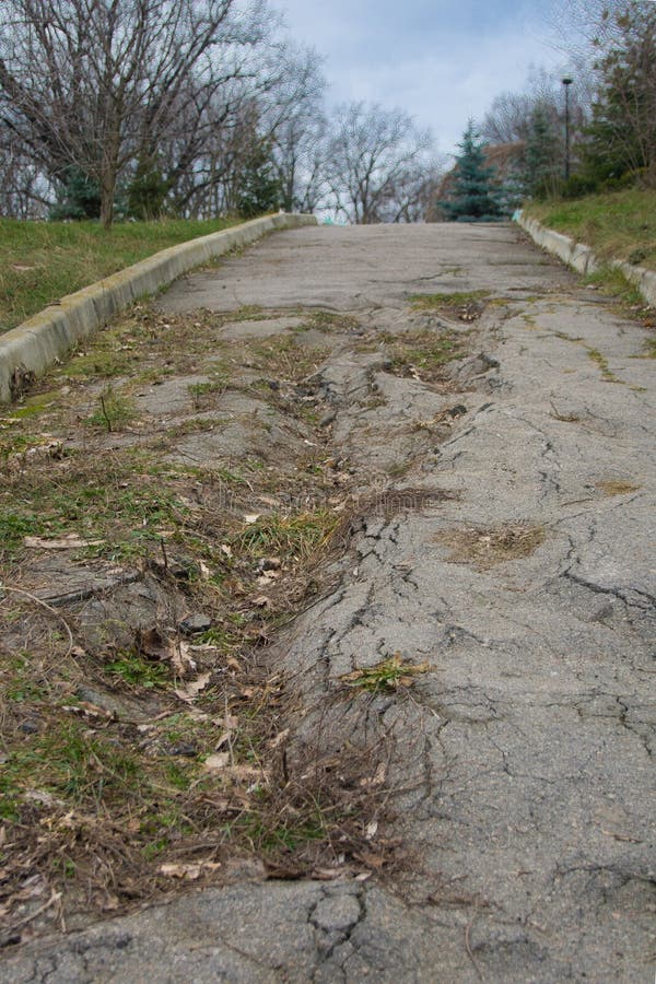 Damaged Asphalt Road After Winter. Stock Photo - Image of driveway ...