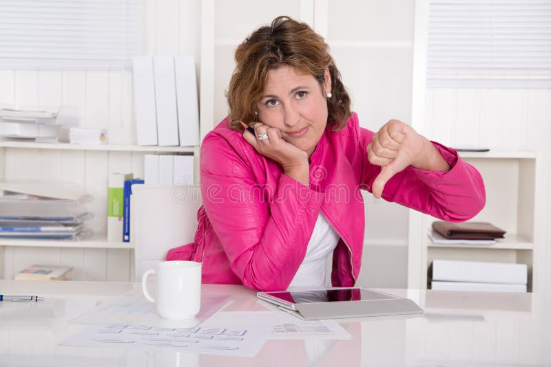 Bad Mood: Woman in the Office with Thumb Down Stock Photo - Image of ...