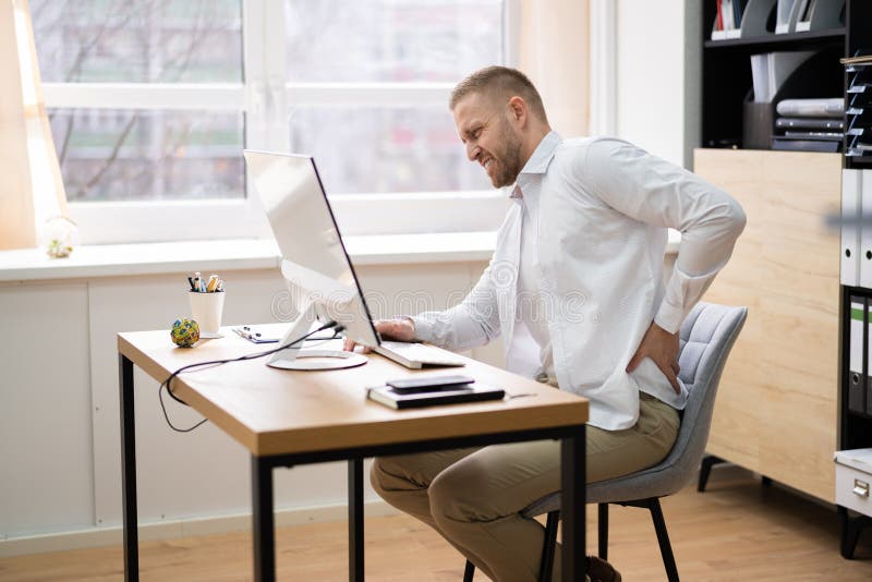 Bad Posture Sitting at Office Desk Stock Photo - Image of backpain ...