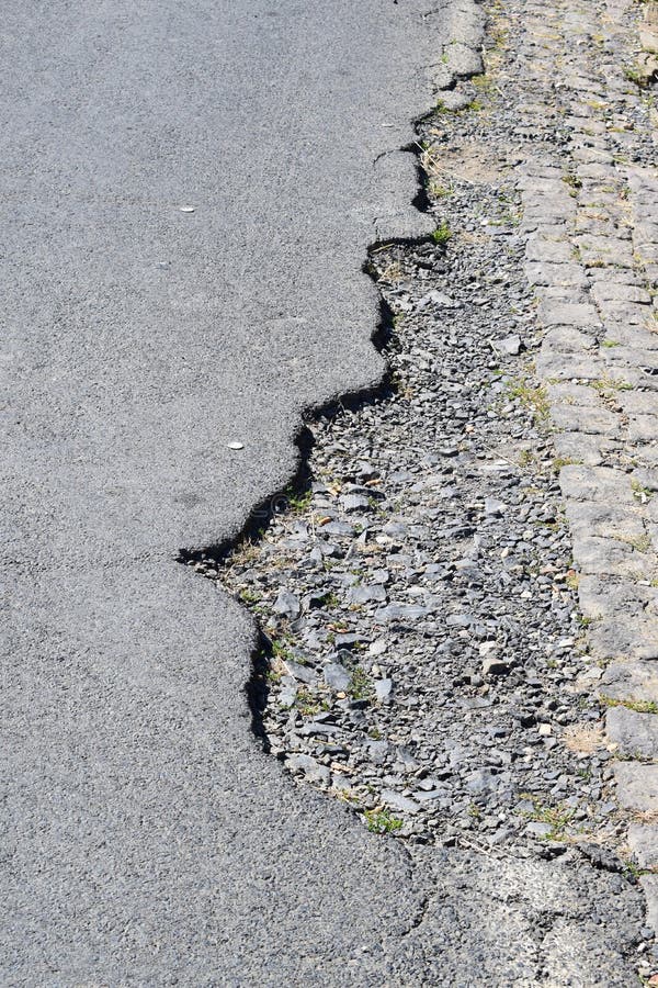A Bad Pothole on the Roadside Stock Photo - Image of pothole, walkway ...