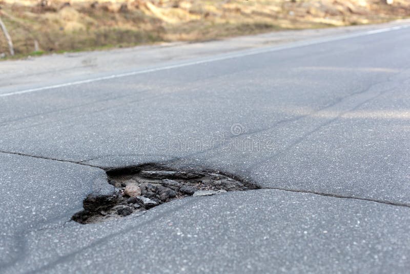 Road crack stock image. Image of crevice, street, road - 111323