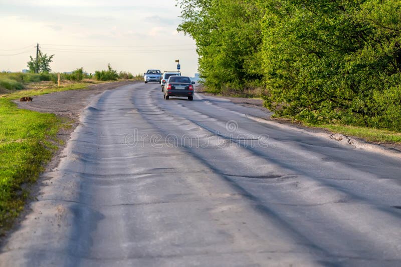 Uneven Road Surface.Poor Asphalt Quality. Stock Image - Image of ...