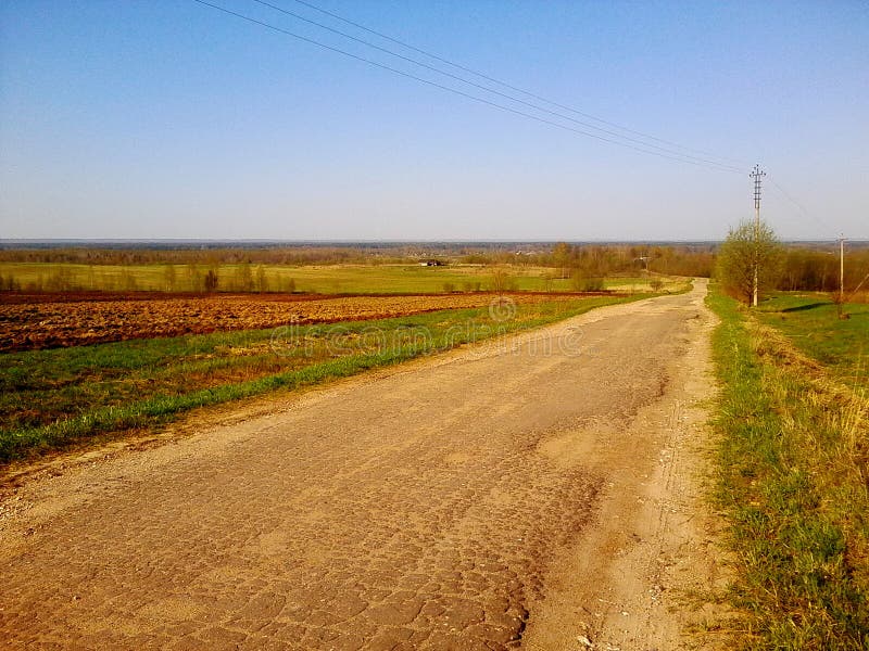 Bad road and landscape stock image. Image of sunny, spring - 76384405
