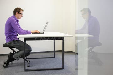 Bad Sitting Posture on Kneeling Chair Stock Image - Image of ...