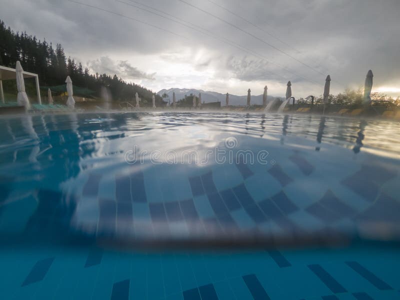 Bad Weather Over a Big Swimming Pool Stock Photo - Image of rain ...
