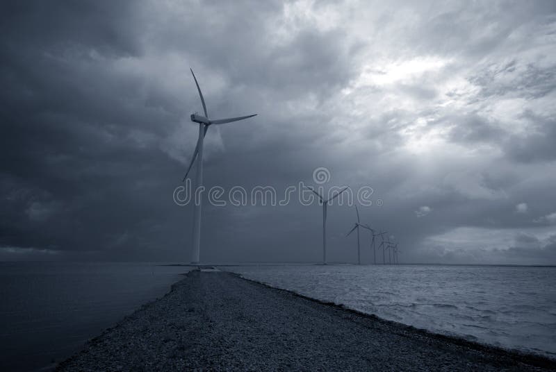 Bad weather and windmills stock photo. Image of water - 10398254