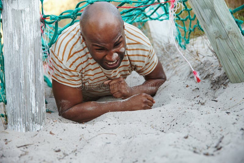 Badass at Bootcamp. a Man Going through a Tough Obstacle Course at ...
