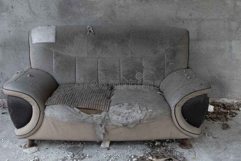 A Badly Damaged Sofa at Horizontal Composition Stock Photo - Image of ...