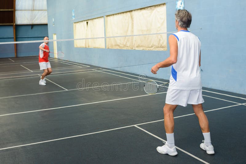Badminton game in progress stock image. Image of recreation - 118889227