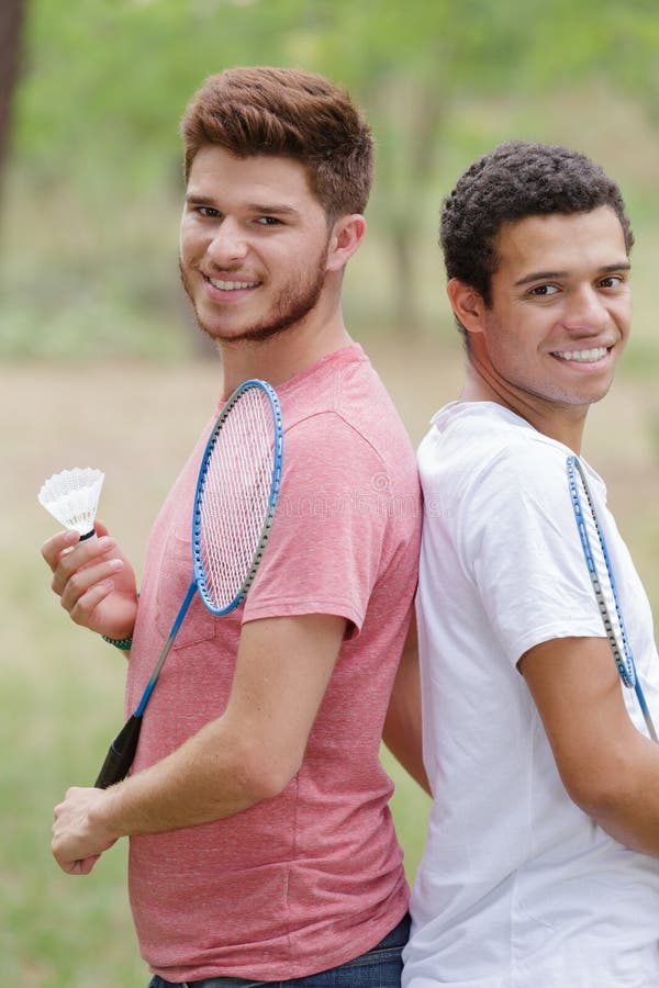 2 Badminton Players Outdoors Stock Image - Image of shuttlecock ...