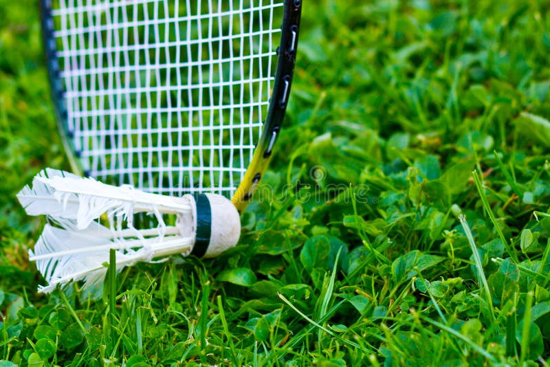 Badminton racket on grass stock image. Image of athlete - 190418775