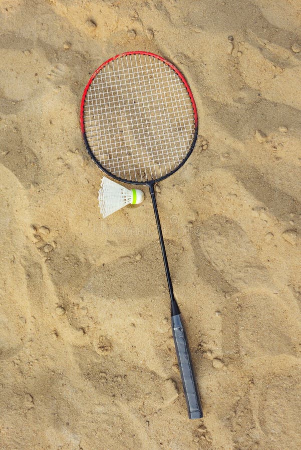 Badminton Racket and Shuttlecock Lying on a Sand Stock Image - Image of ...