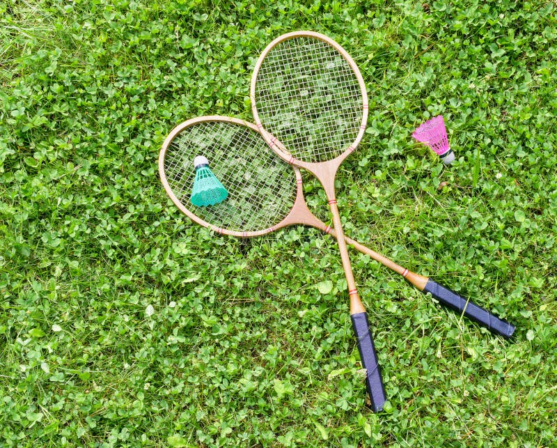 Badminton Rackets And Shuttlecock On Grass Stock Photo - Image of ...