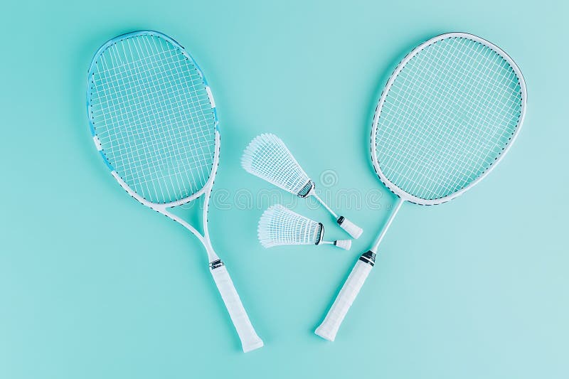Badminton Rackets and Shuttlecocks on Pastel Turquoise Backdrop, Flat ...
