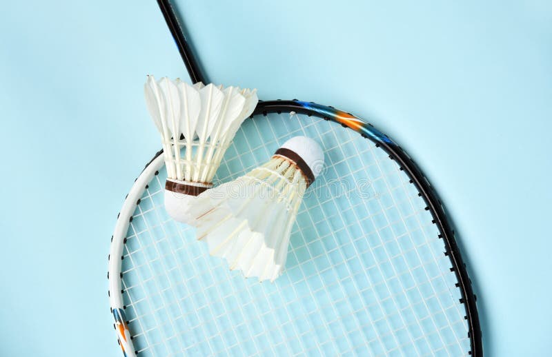 Badminton Shuttelcock on Glass Reflection with Racket As a Background ...