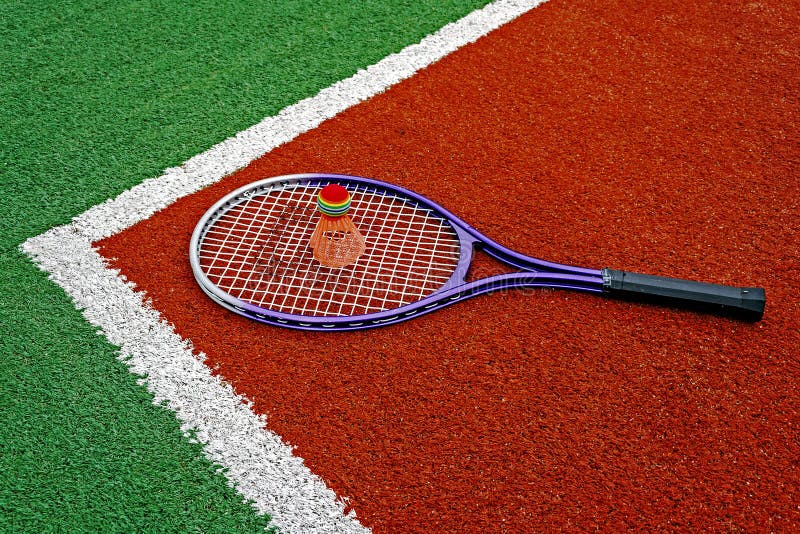 Badminton Shuttlecock & Racket Stock Photo - Image of nylon, ground ...