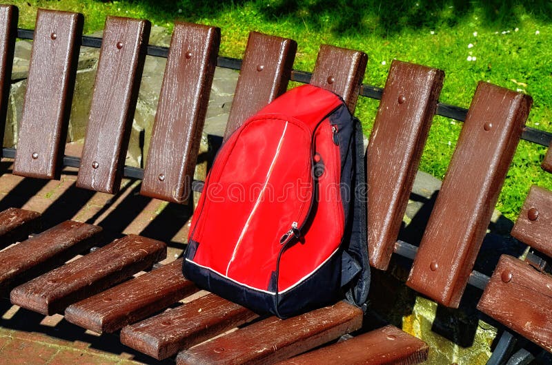 Bag on the Bench in Autumn Park Stock Image - Image of backpack, autumn ...