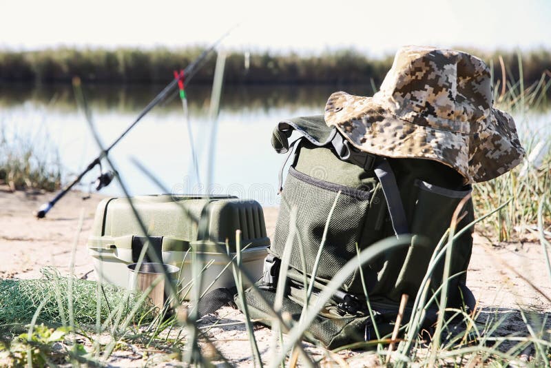 Bag with Fishing Essentials at Riverside Stock Image - Image of ...
