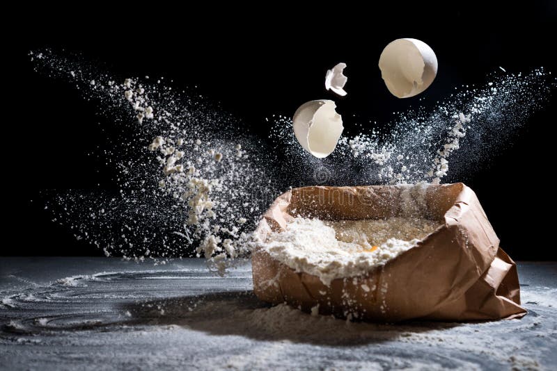 White Powder Splash on Black Background. Flour Sifting on a Black ...
