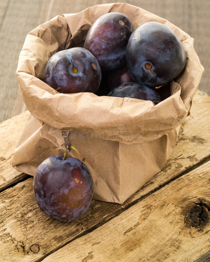 Bag of Fresh Purple Plums stock photo. Image of ripe - 26639810
