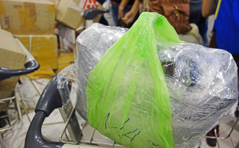 Bag in hand cart stock photo. Image of business, bags - 46167118