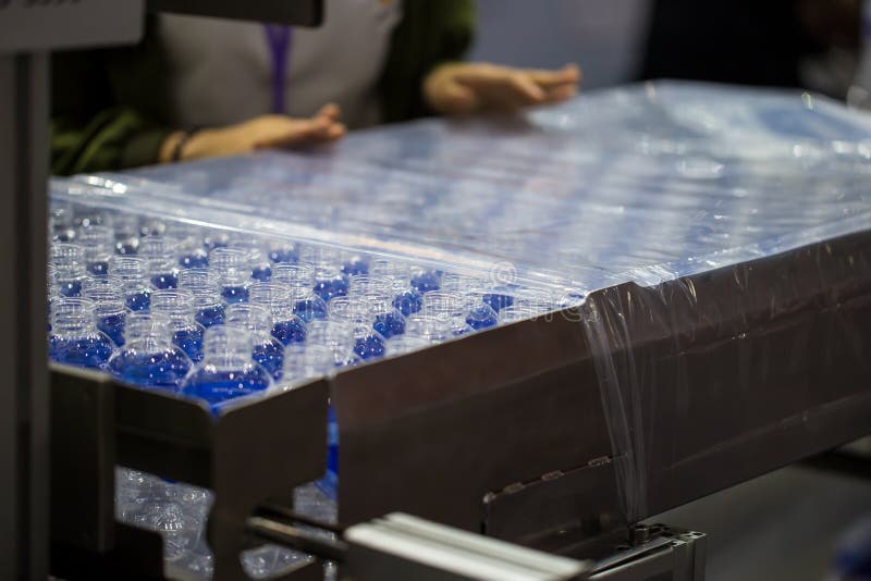 Bag Packing Machine for Empty Plastic Bottles Stock Image - Image of ...