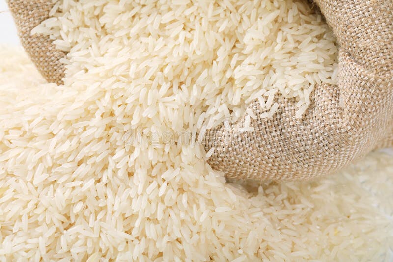 Bag and Pile of White Long Grained Rice Stock Photo - Image of ...