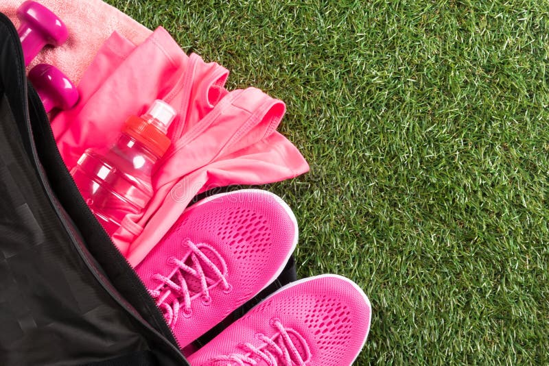 Bag with Pink Sports Things for Training on Green Grass Stock Photo ...