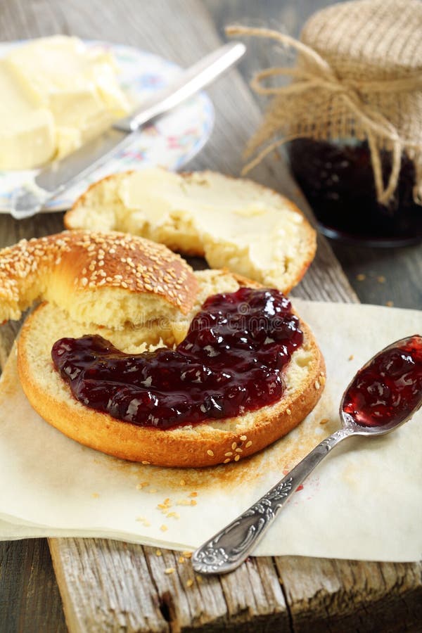 Bagel with jam and butter. stock image. Image of seed - 40869409