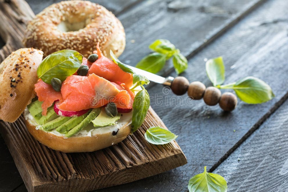Bagel with Salmon. White Bagel with Fish and Herbs Stock Photo - Image ...