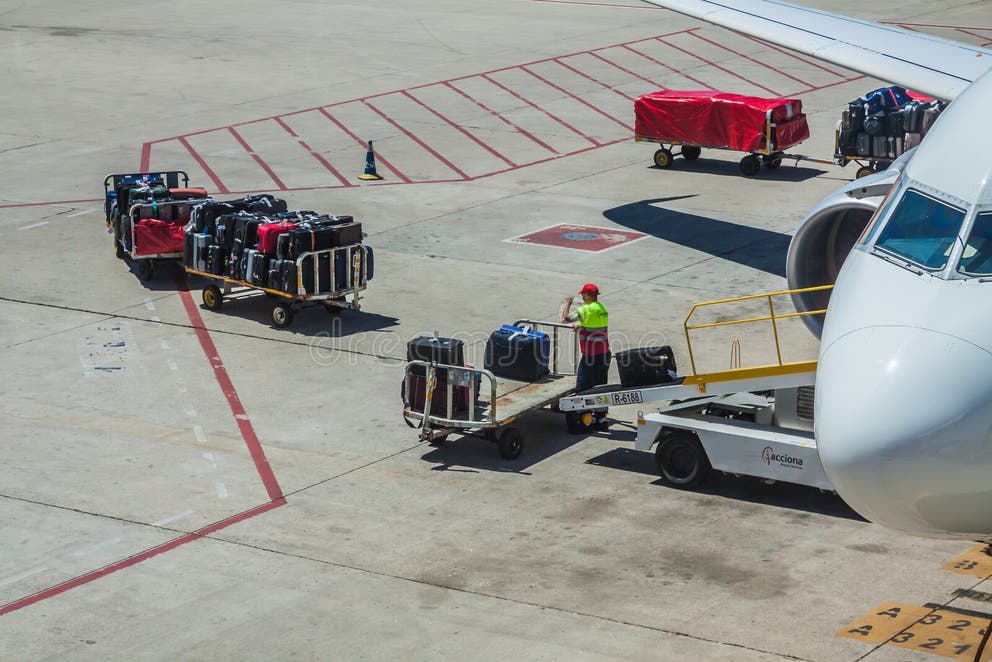 Baggage Handler Working at the Airport Editorial Photo - Image of ...