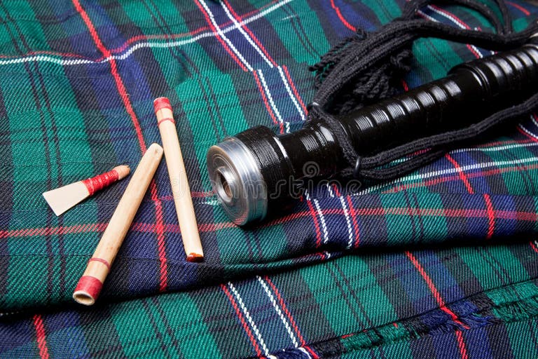 Bagpipe reeds on tartan stock photo. Image of reeds, national - 13291946