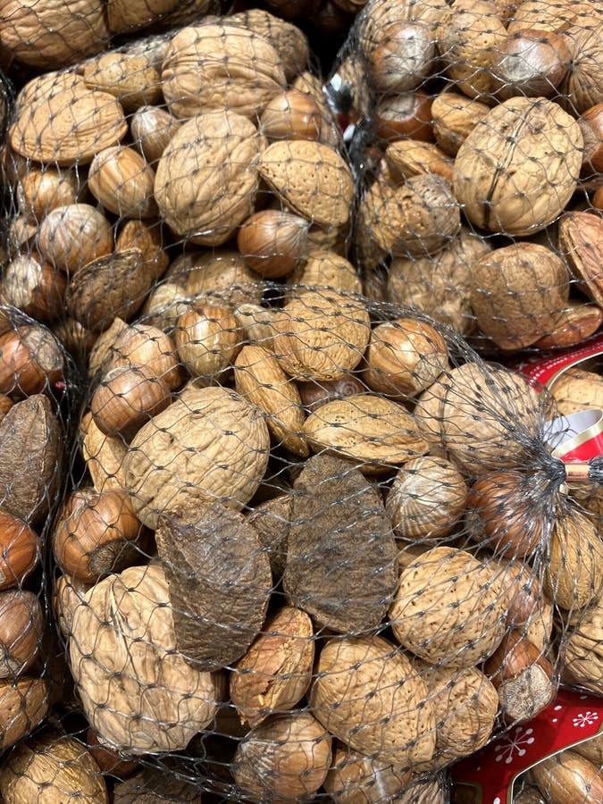 Bags of assorted nuts stock photo. Image of food, ingredient - 299712132