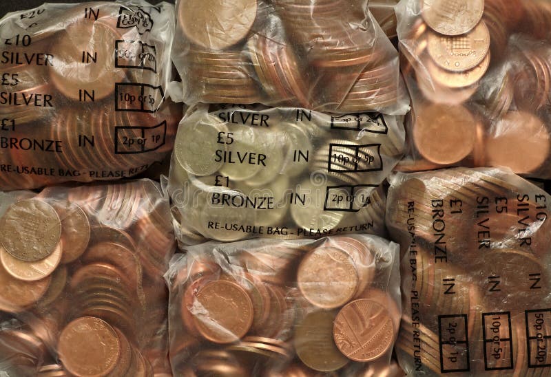 Bags of Coins stock photo. Image of change, plastic, full - 21116046