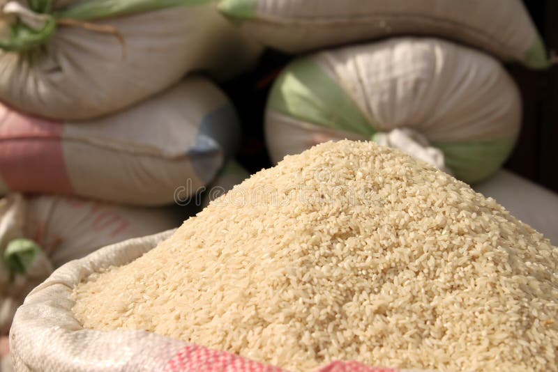 Bags of rice for sale stock photo. Image of range, merchandise - 24444338